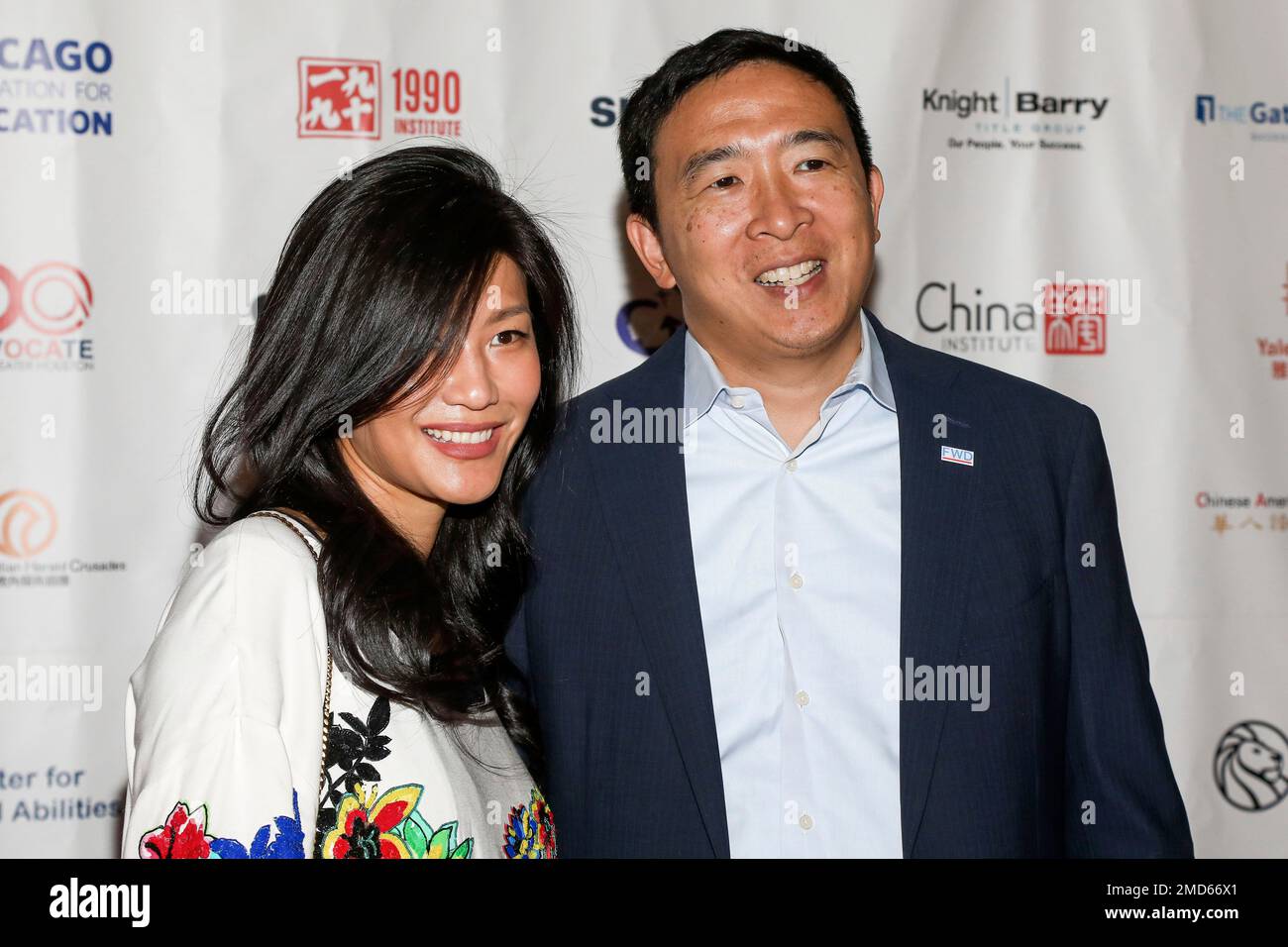 Evelyn Yang, left, and Andrew Yang, right, attend the premiere of ...