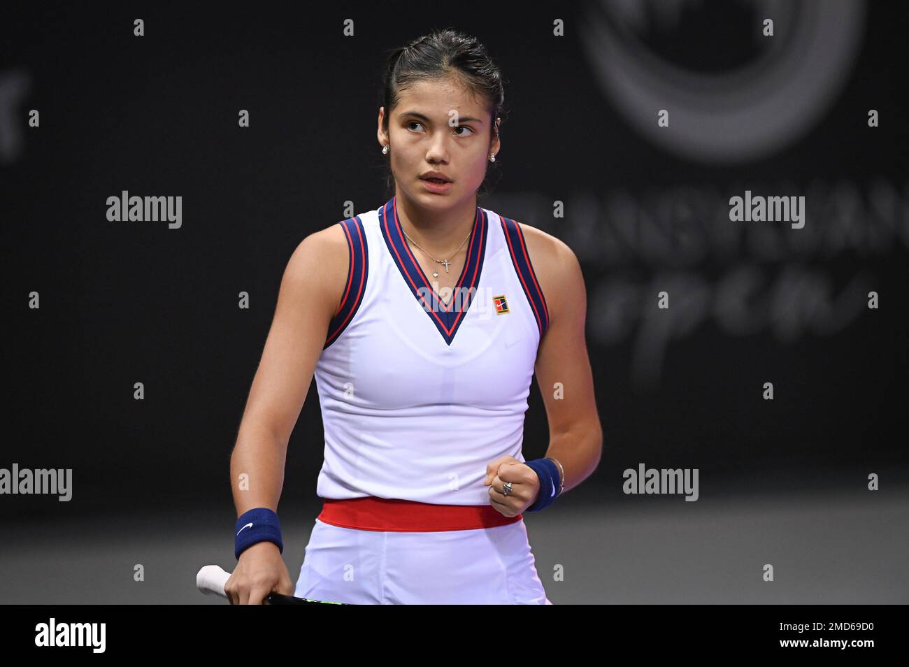 Emma Raducanu, of Britain, reacts after winning a point against Romania ...