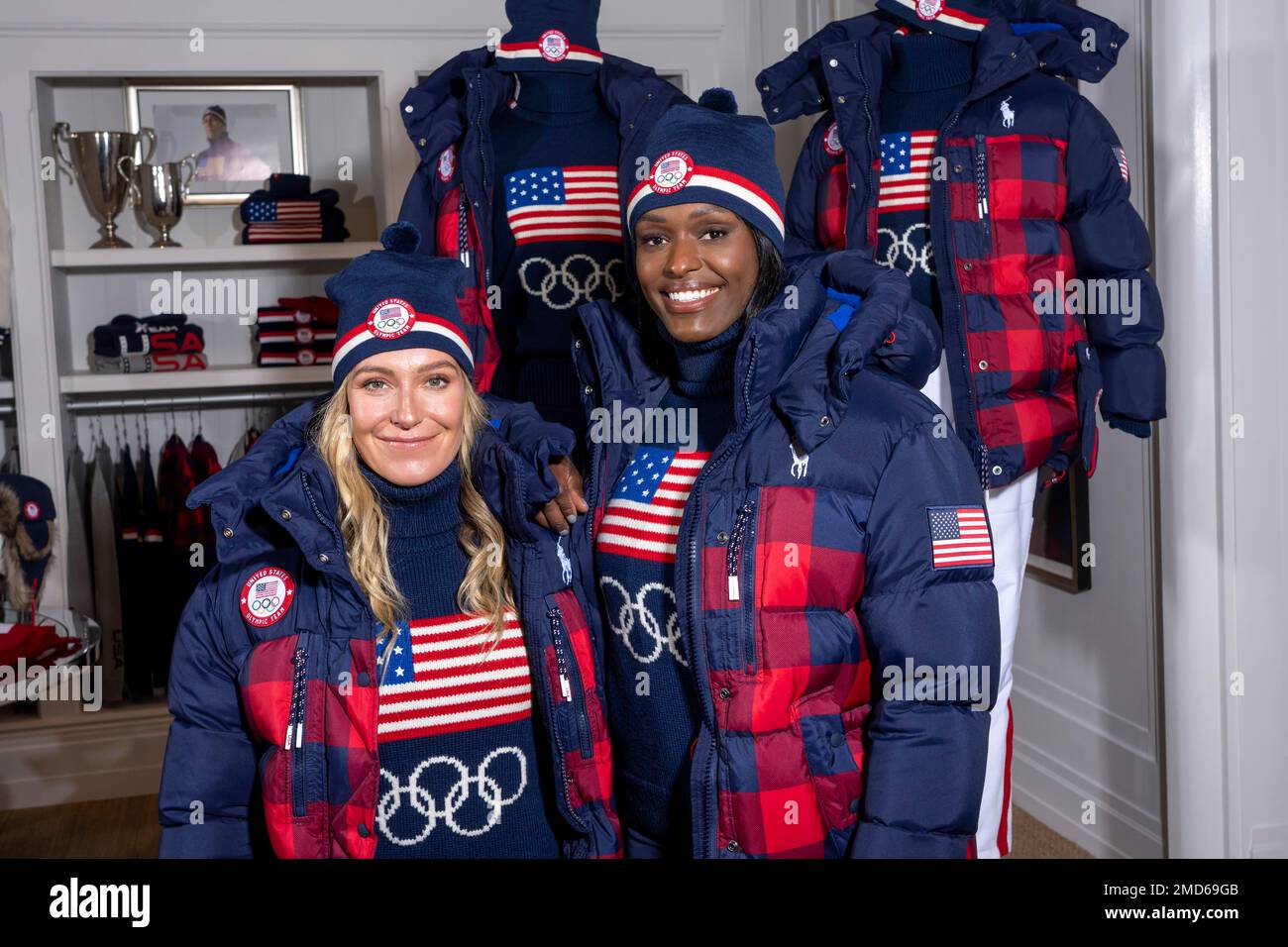 Snowboarder Jamie Anderson, left, and bobsledder Aja Evans model the Team USA Beijing winter ...