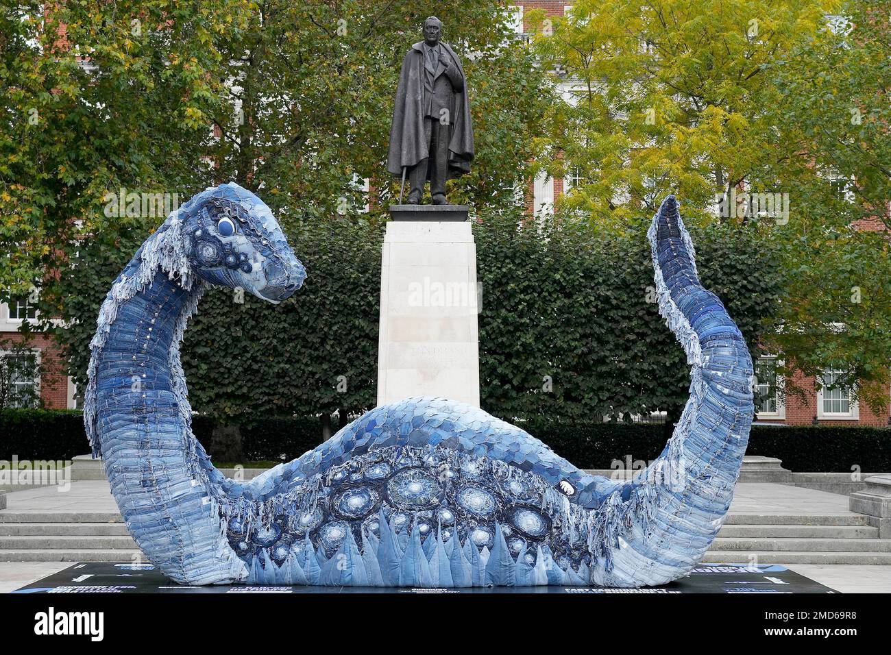 'Messy' the COP Ness Monster sits in front of a statue of Franklin D ...