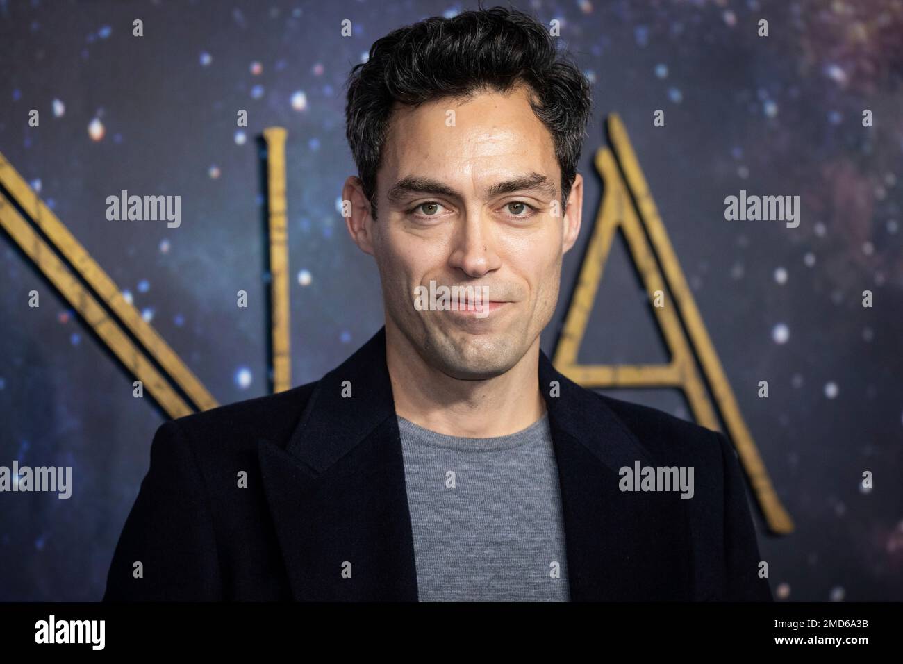 Alex Hassell poses for photographers upon arrival at the premiere of ...