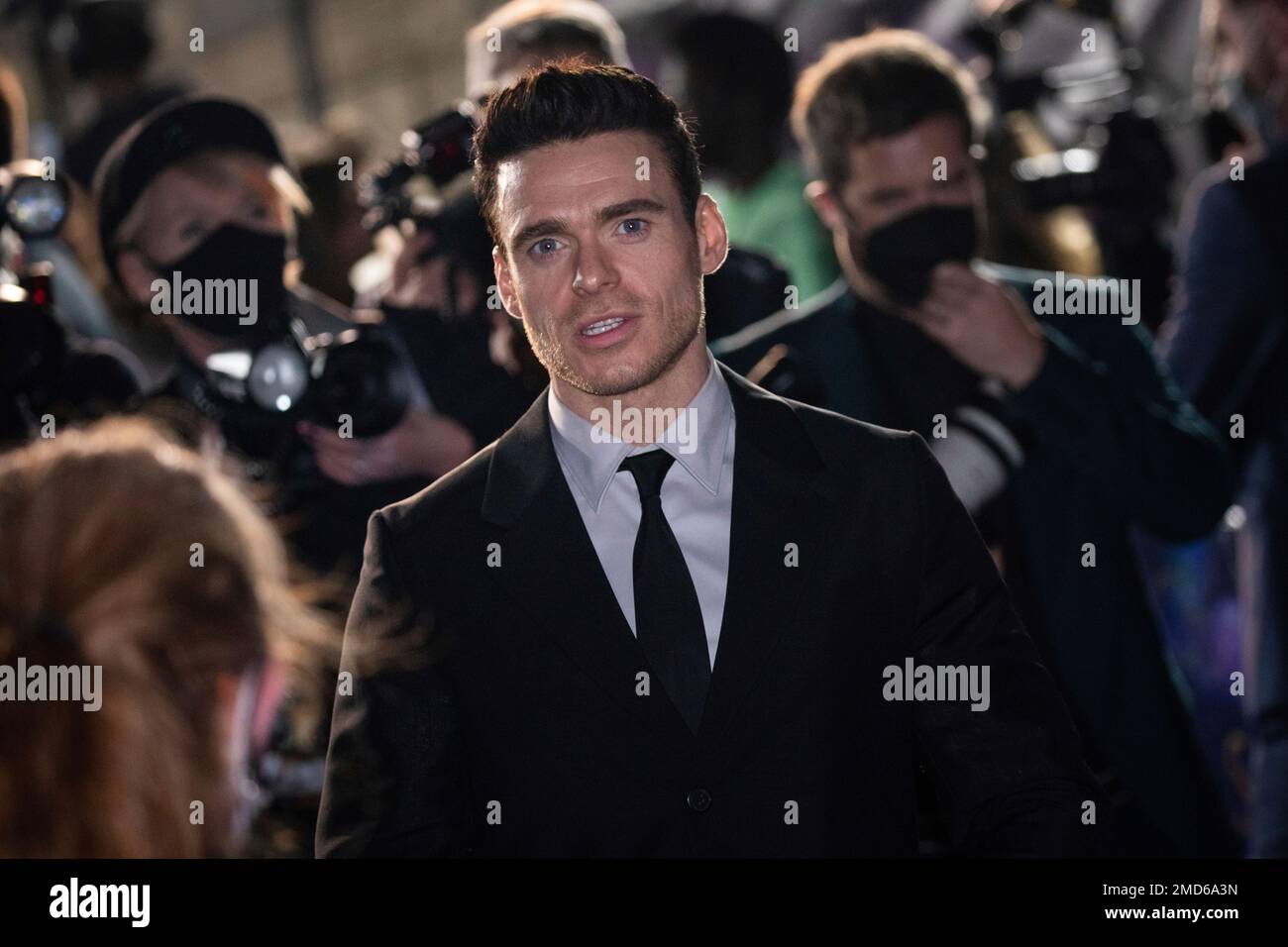 Richard Madden poses for photographers upon arrival at the premiere of ...