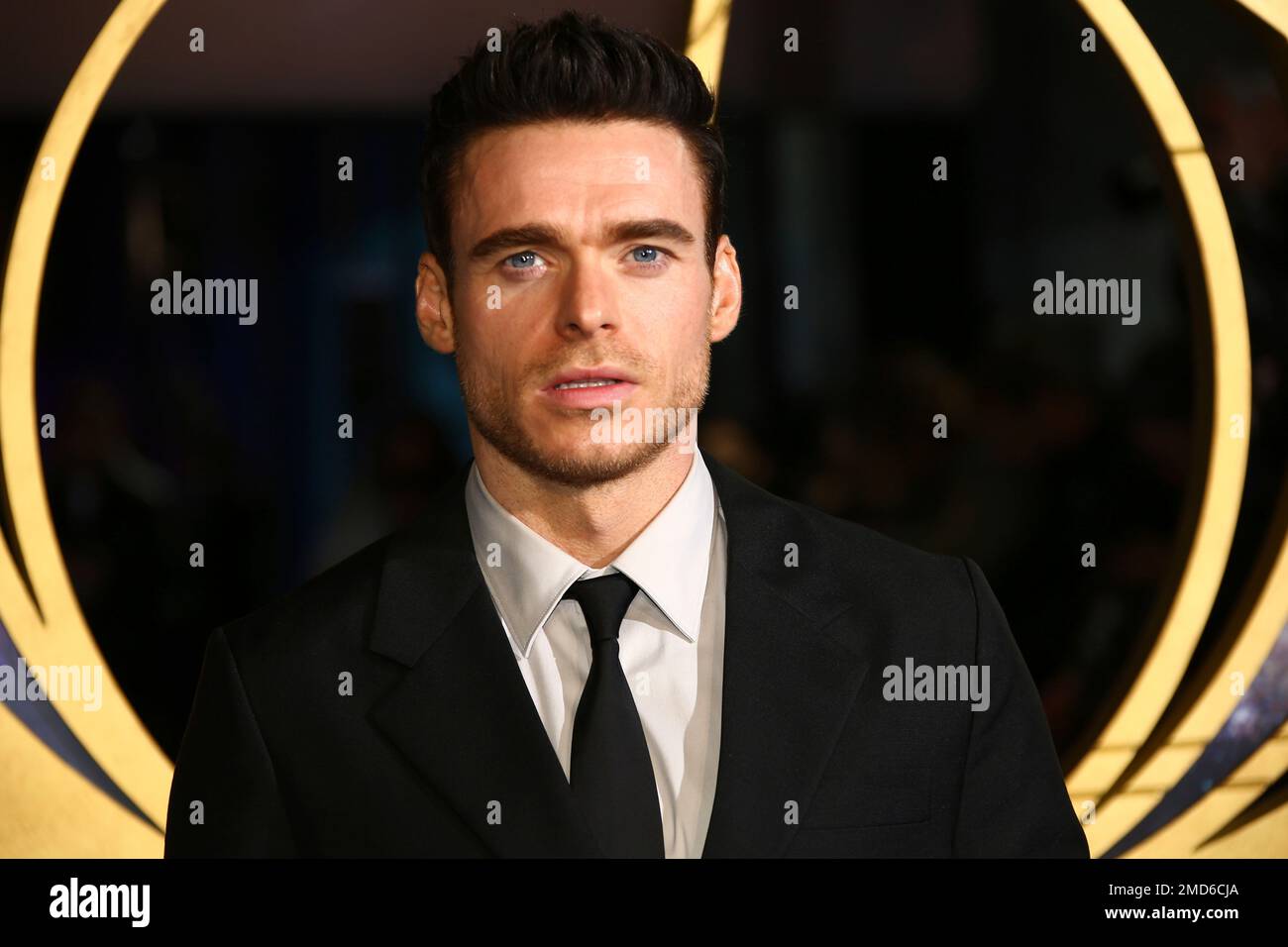 Richard Madden poses for photographers upon arrival at the premiere of ...