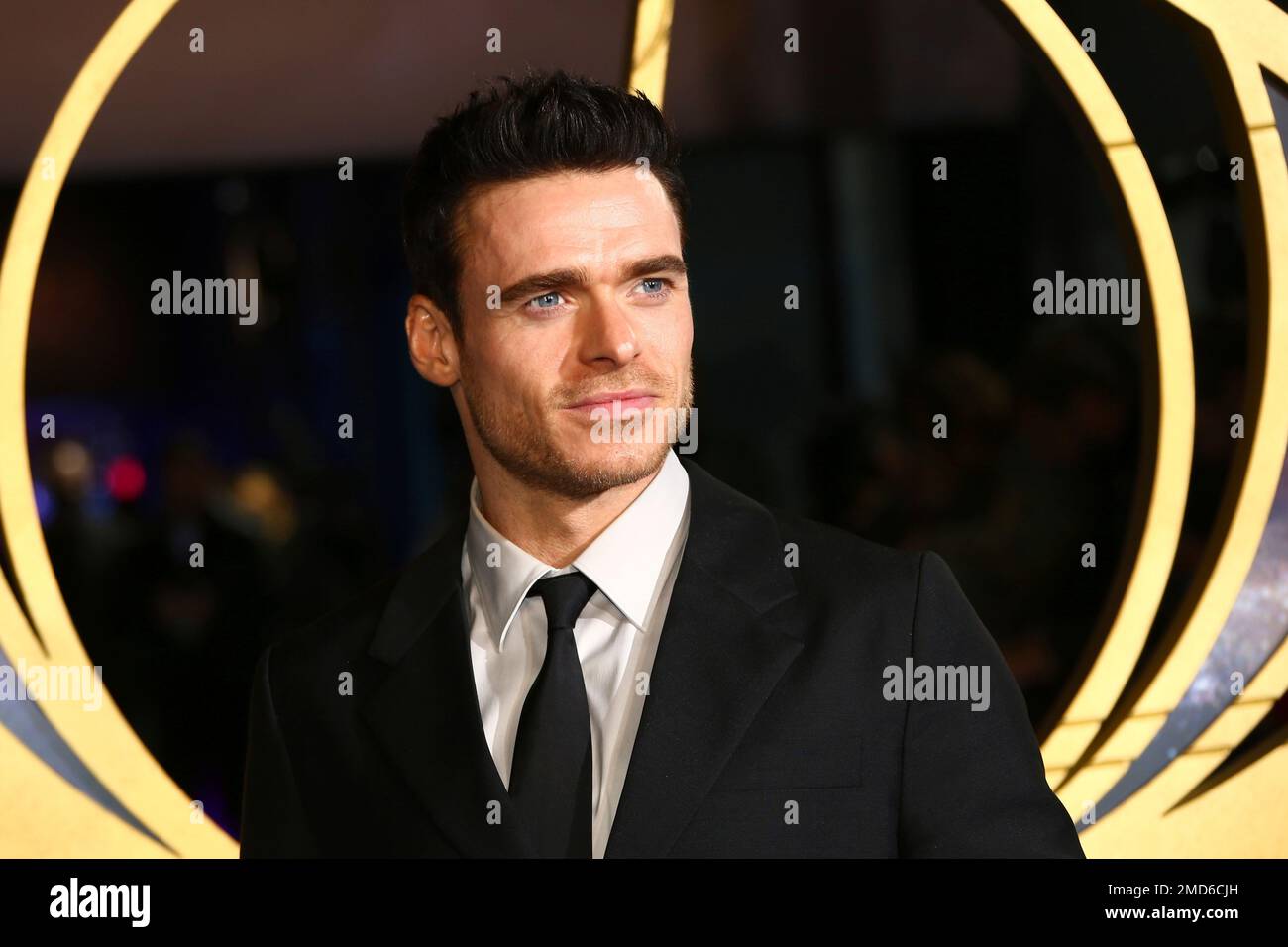 Richard Madden poses for photographers upon arrival at the premiere of ...