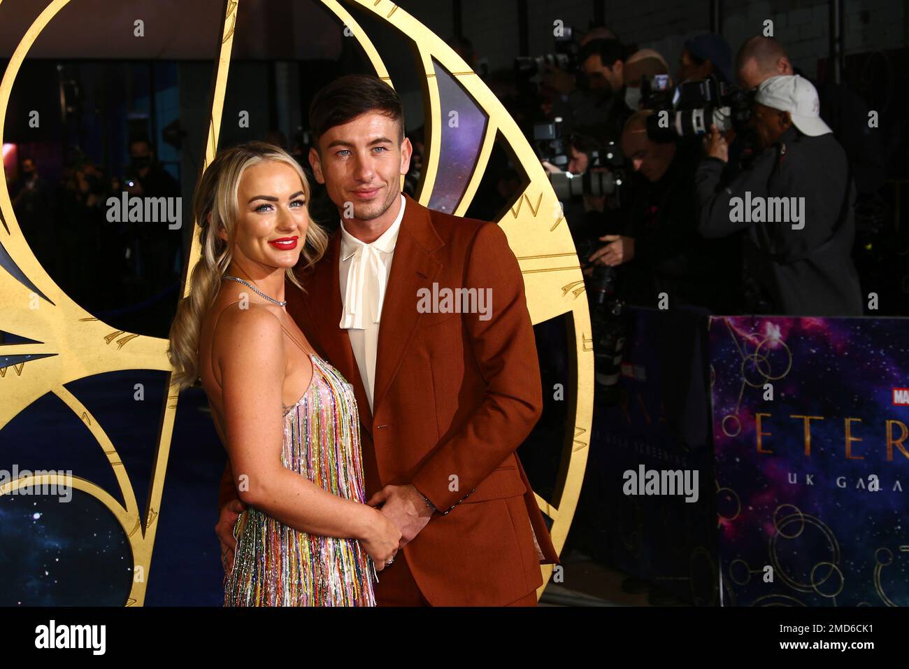 Alyson Sandro, left, and Barry Keoghan pose for photographers upon ...