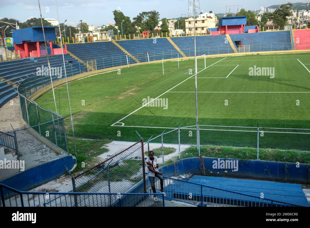 A security guard stands on a fence at the Sylvio Cator stadium in Port ...