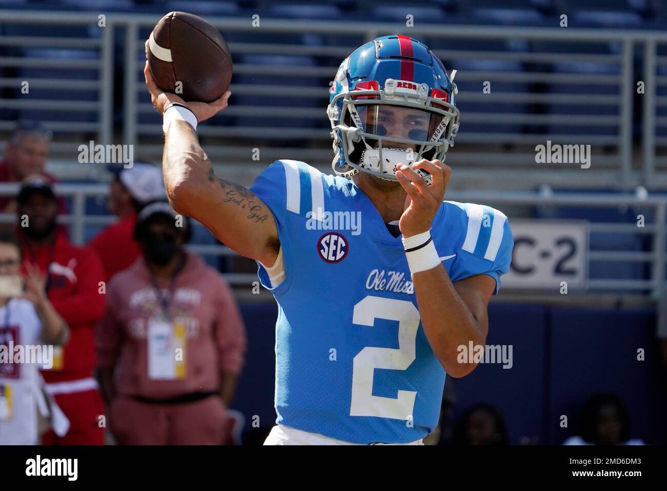 Mississippi quarterback Matt Corral (2) warms up during pregame drills ...