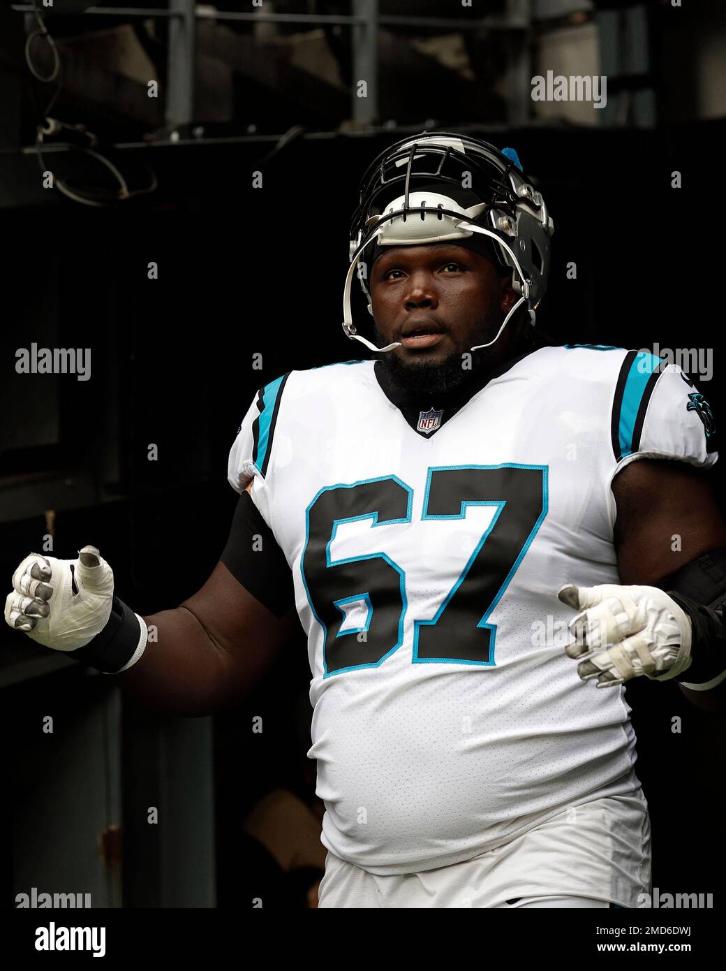 Carolina Panthers guard John Miller (67) takes the field to face the ...
