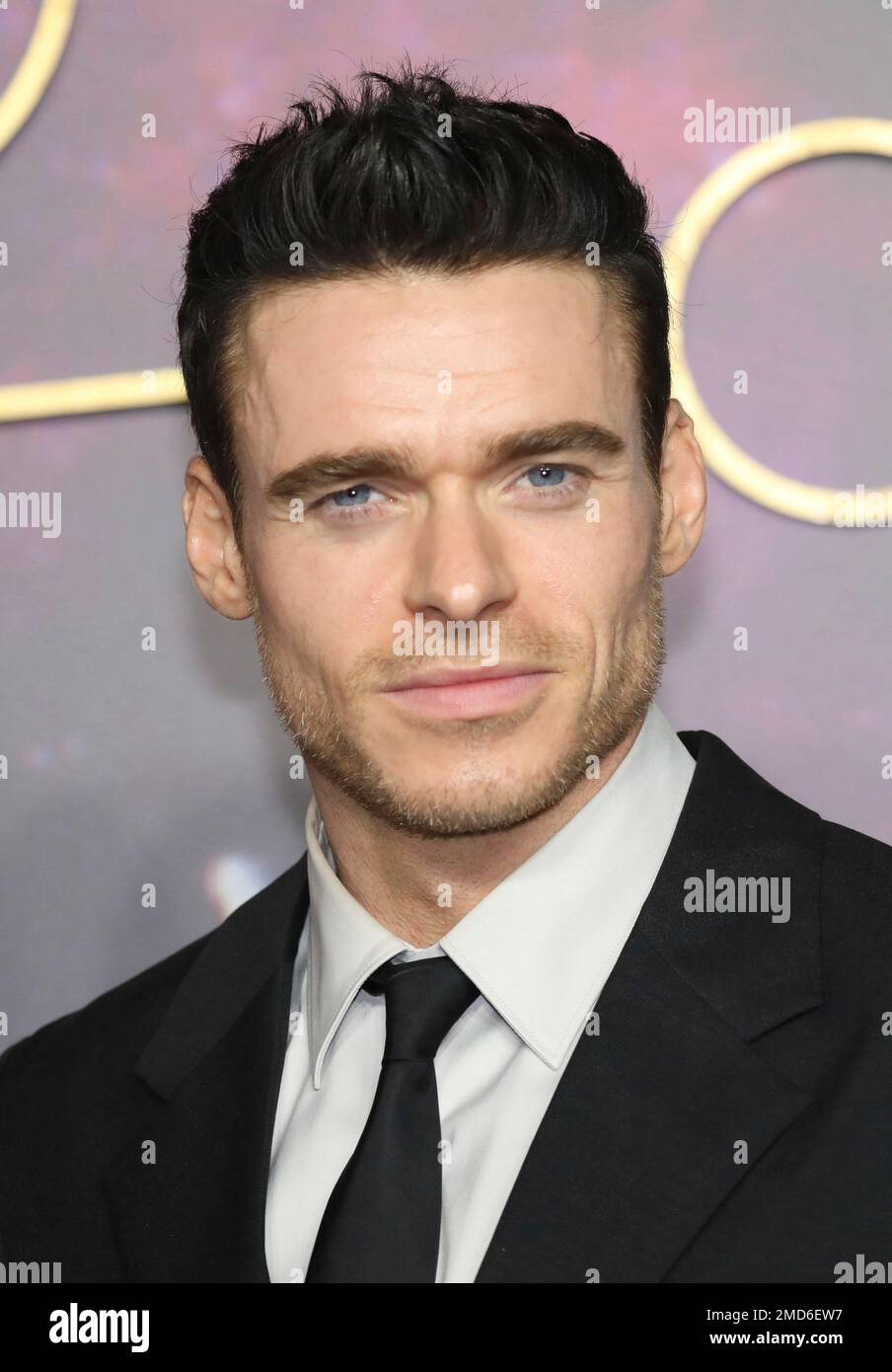 Richard Madden poses for photographers upon arrival at the premiere of ...