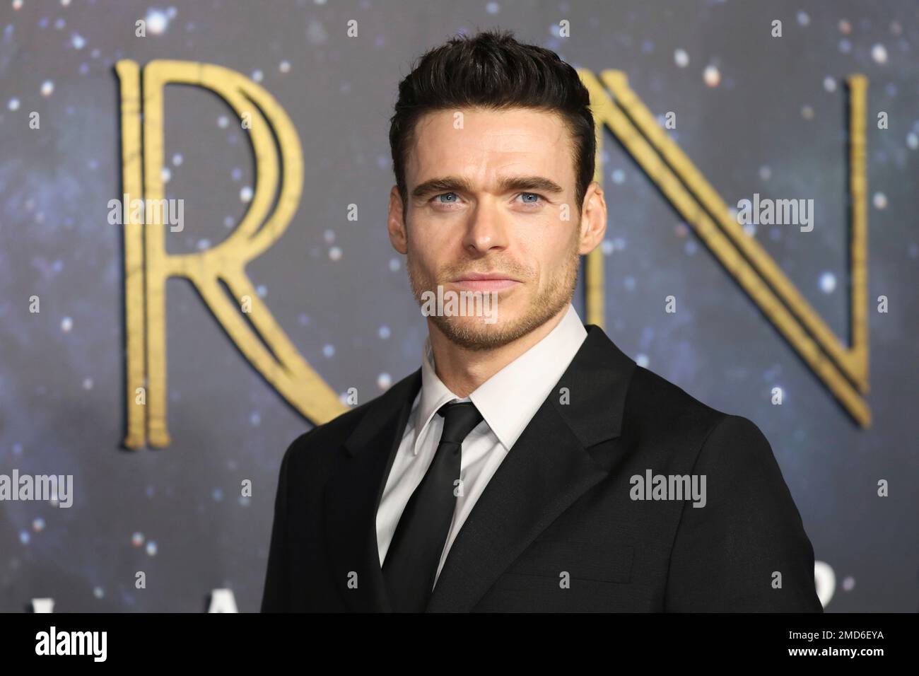 Richard Madden poses for photographers upon arrival at the premiere of ...