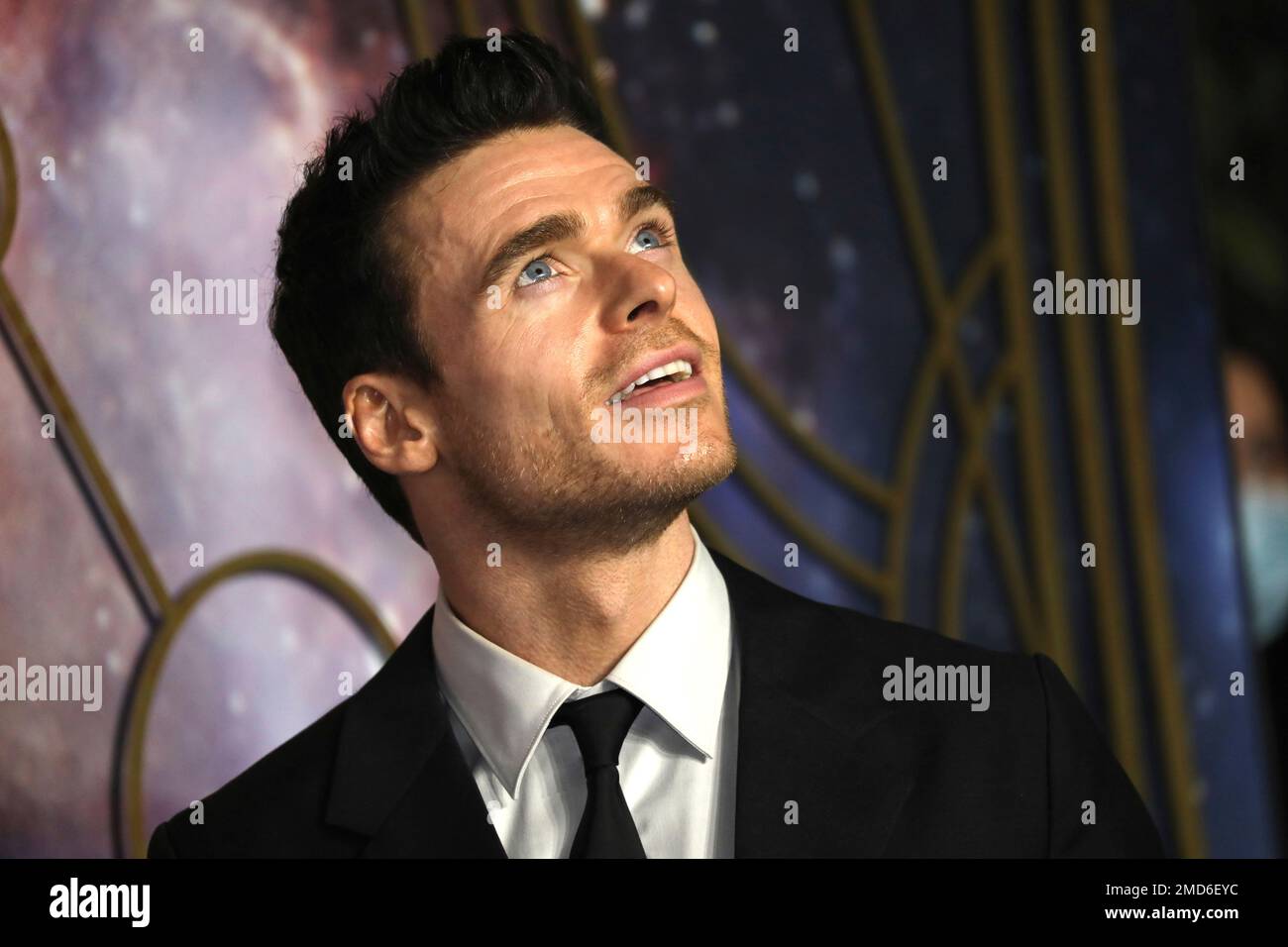 Richard Madden poses for photographers upon arrival at the premiere of ...