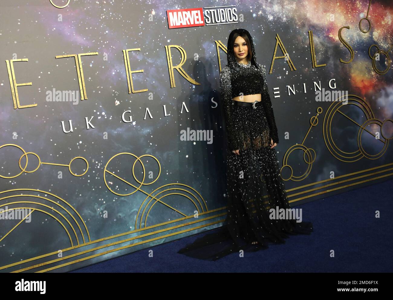 Gemma Chan poses for photographers upon arrival at the premiere of the ...