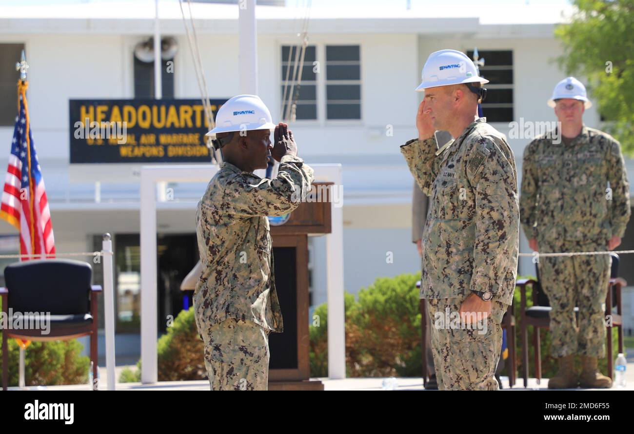 (CHINA LAKE) – Capt. Laurie Scott and Cmdr. Ben Wainwright exchange ...