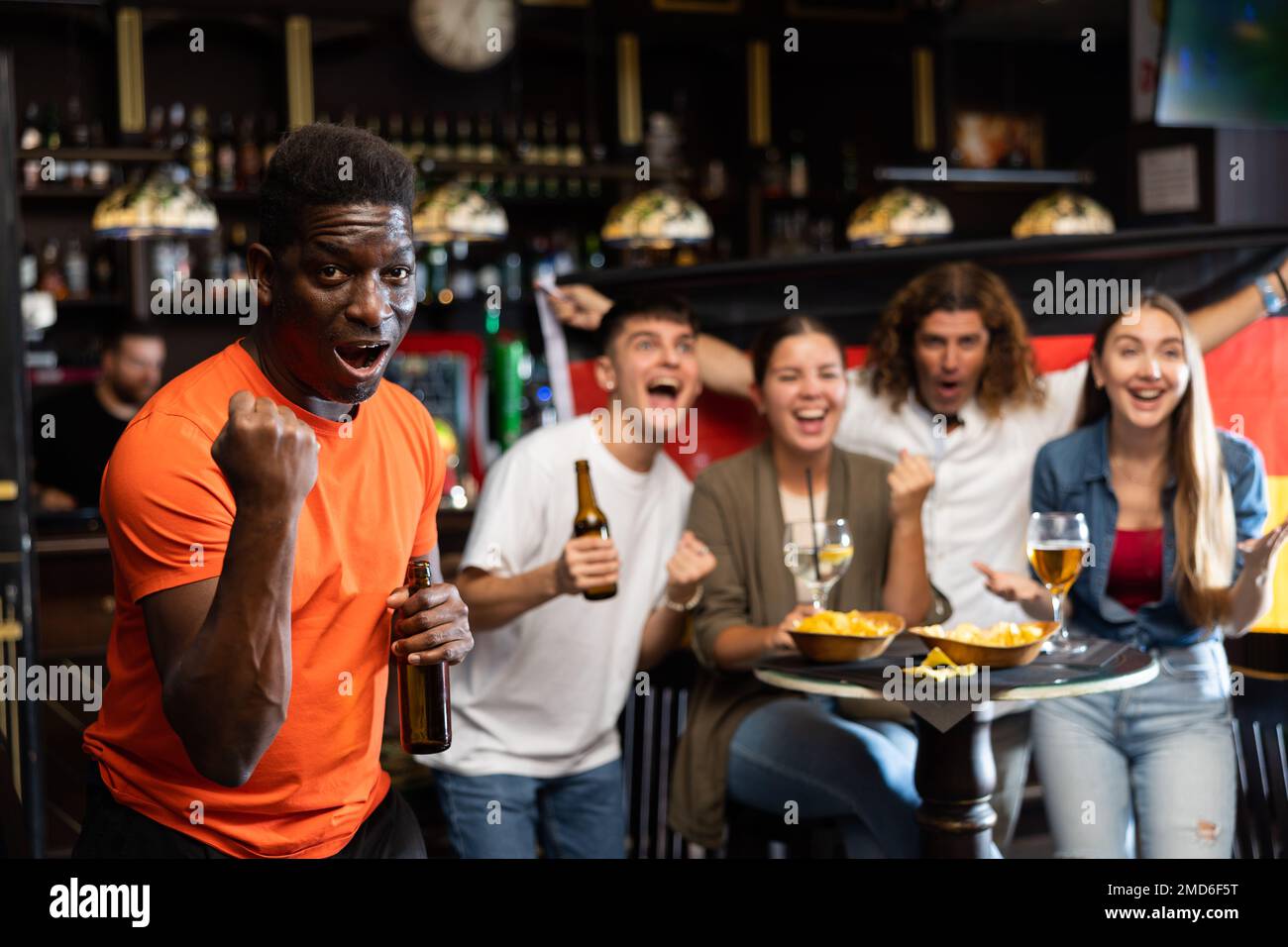Excited african american man celebrating victory of favorite German ...