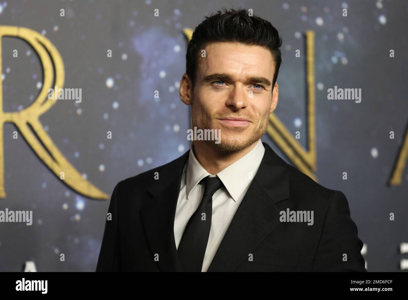Richard Madden poses for photographers upon arrival at the premiere of ...