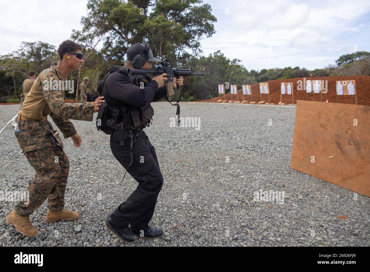 U.S. Marine Corps Cpl. Ty Krotz, a range coach with Task Force Koa ...