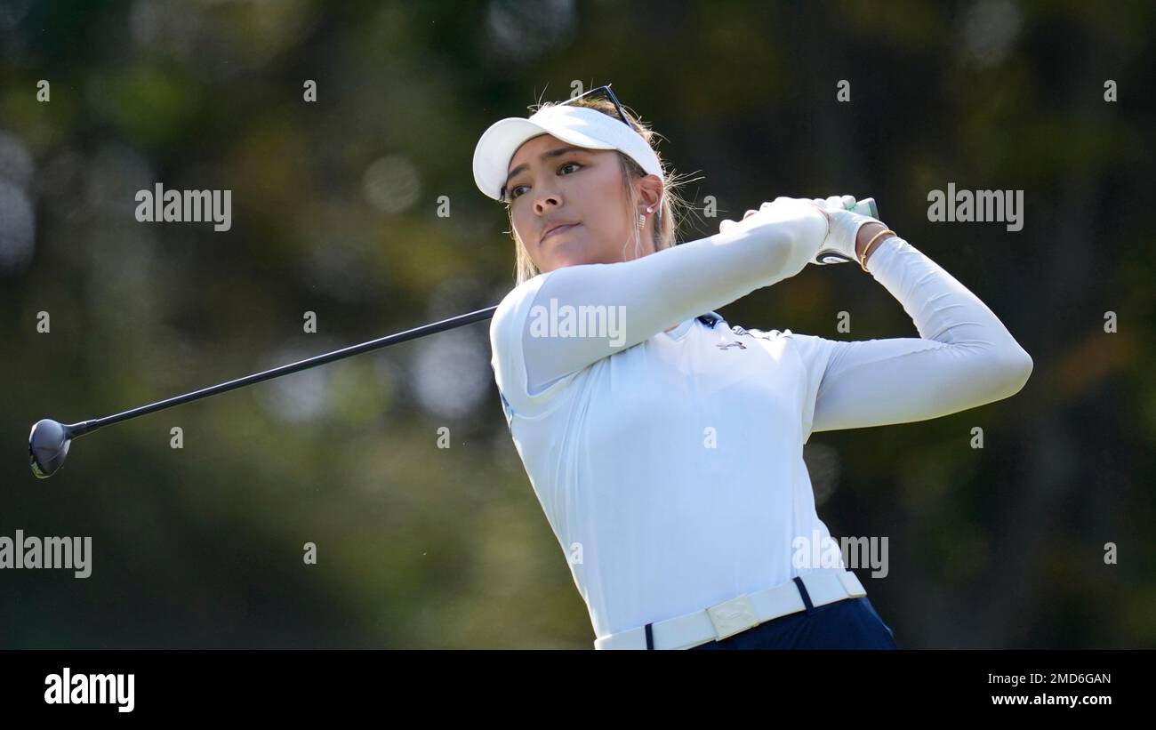 Alison Lee of the United States watches her shot on the fifth hole ...
