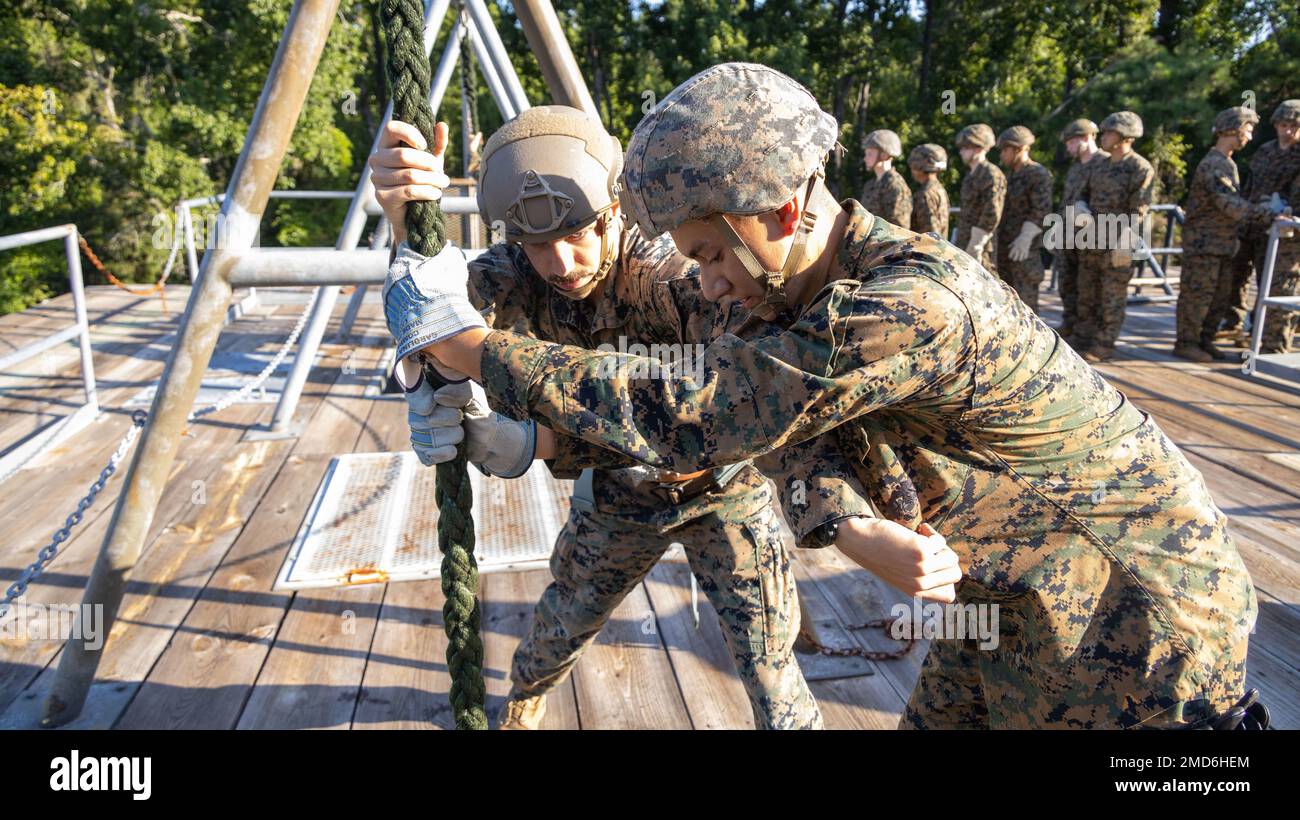 MIDN Jonathan Rodriguez (right), a midshipman at The University of New ...
