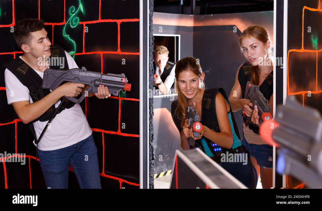 Positive players playing in teams Stock Photo - Alamy