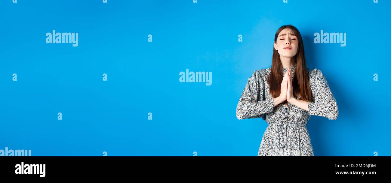 Pleading woman in dress begging for wish come true, supplicating god ...