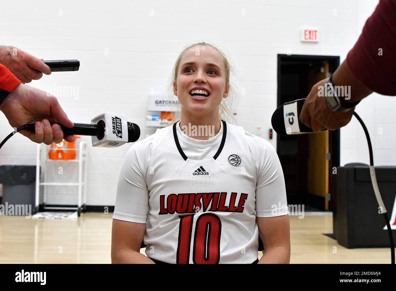 Louisville guard Hailey Van Lith (10) answers questions during the team ...