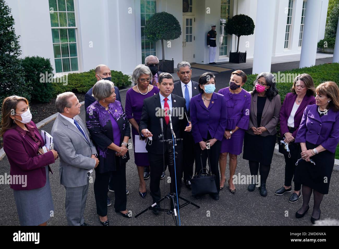 Rep. Raul Ruiz, D-Calif., center, standing with other House Democrats ...