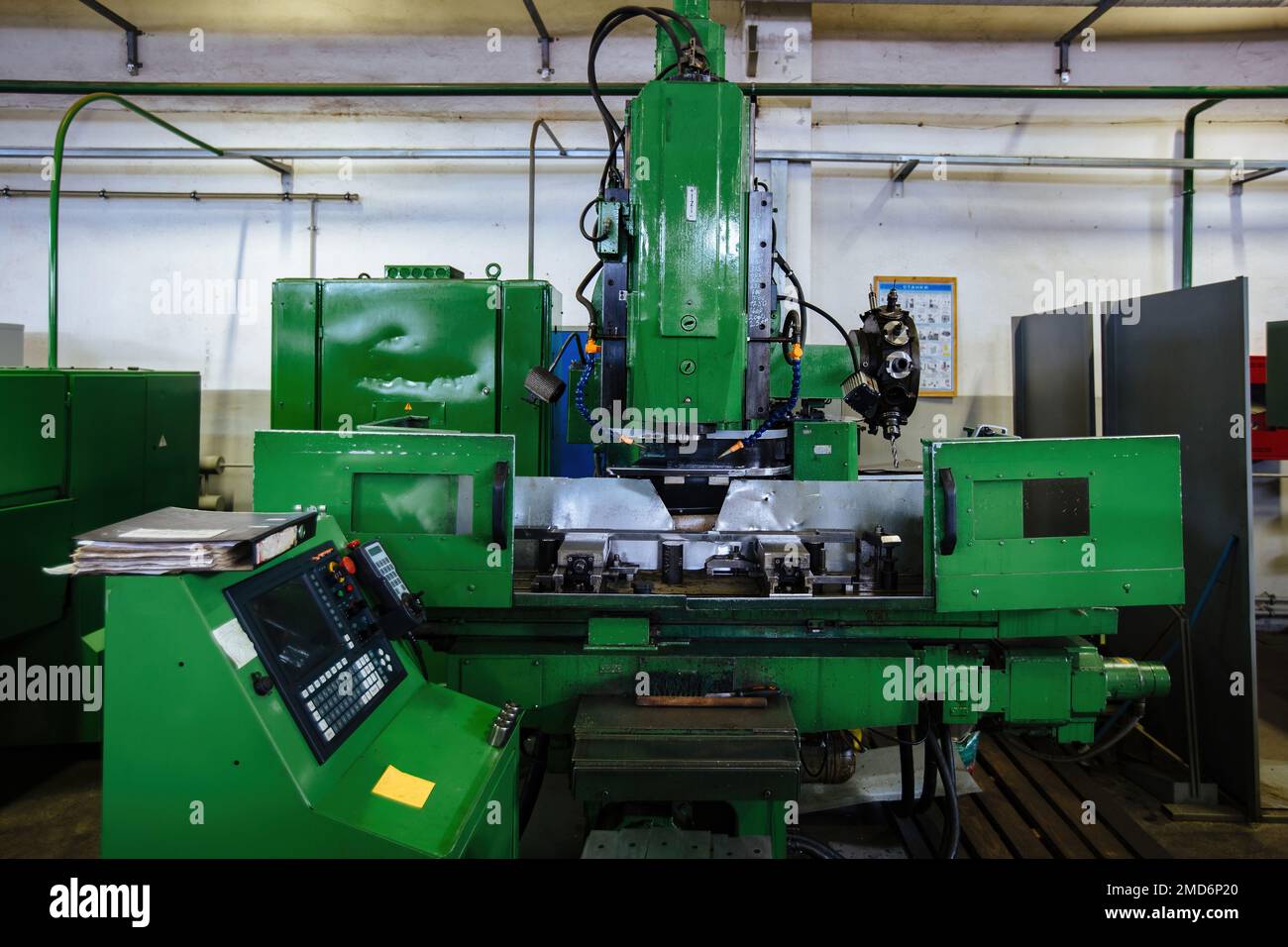 Industrial CNC machine tools in metalworking workshop Stock Photo - Alamy