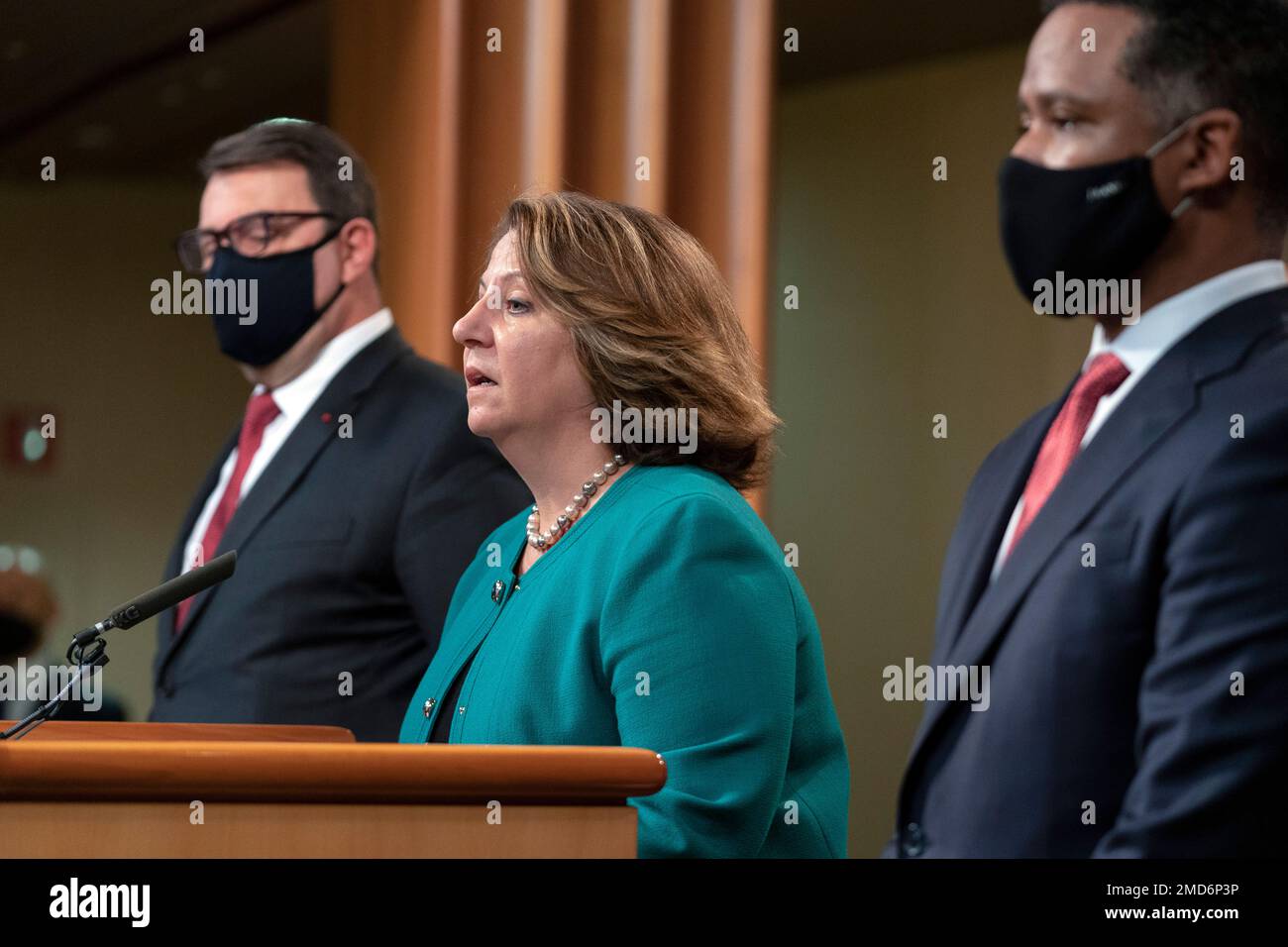 Deputy Attorney General Lisa Monaco, center, together with Deputy ...
