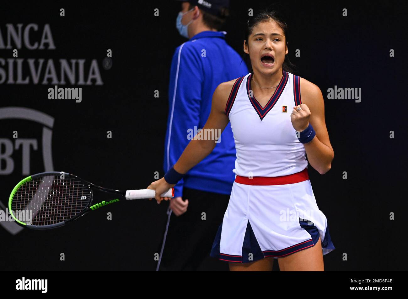 Emma Raducanu, of Britain, reacts after winning the second set and ...