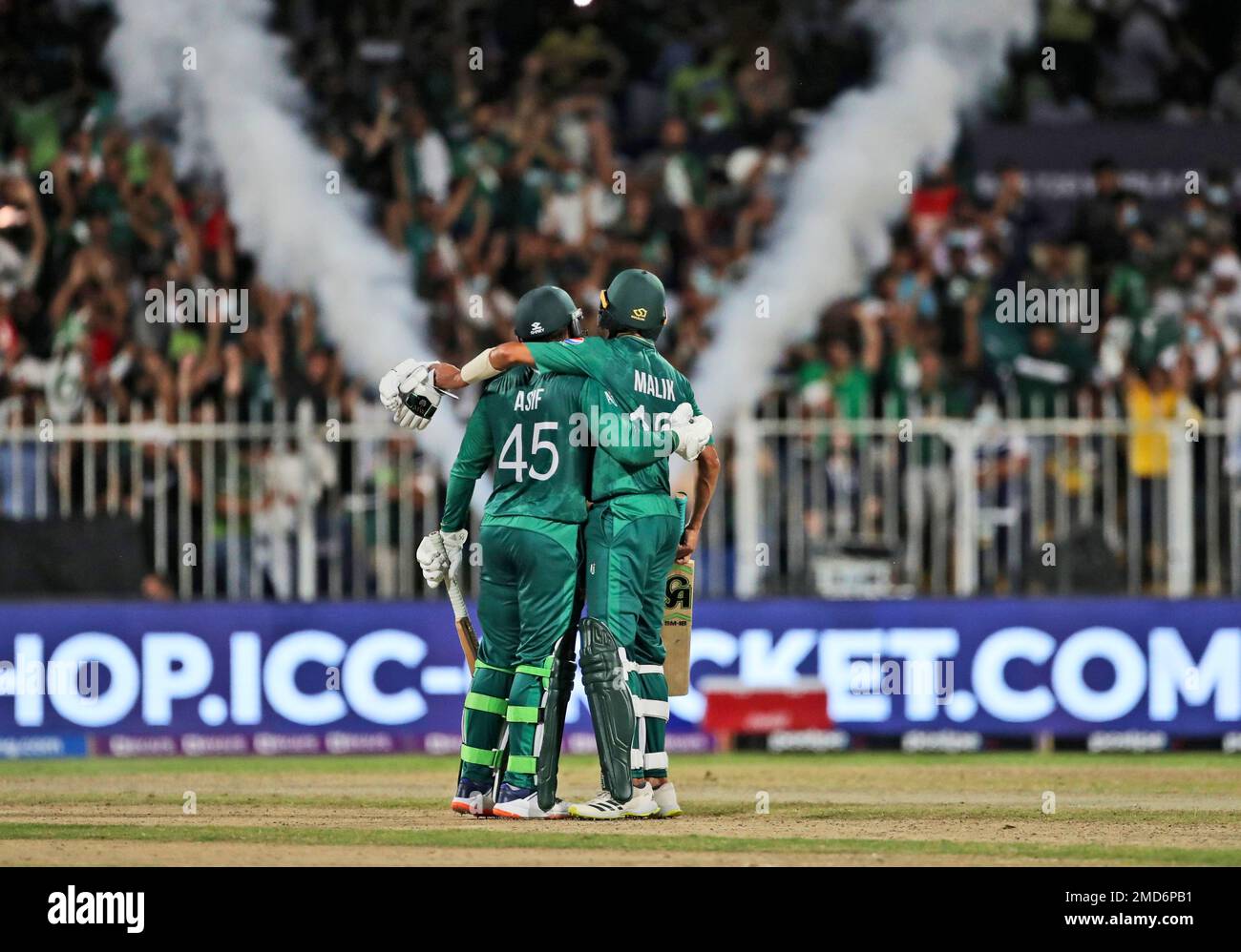 Pakistan's Asif Ali, left, and Shoaib Malik celebrate scoring runs just ...