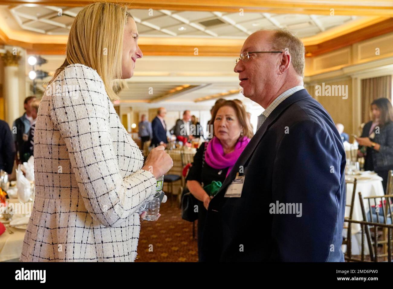 State. Rep. Caroline Simmons, left, D-Stamford, speaks to voters after ...