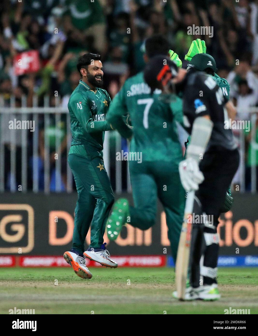 Pakistan's Mohammad Hafeez celebrates the dismissal of New Zealand's ...