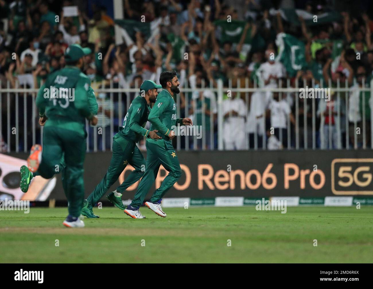 Pakistan's Mohammad Hafeez, right, celebrates the dismissal of New ...