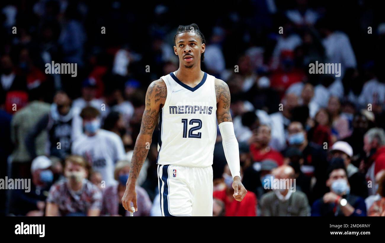 Memphis Grizzlies guard Ja Morant (12) walks on the court during the ...