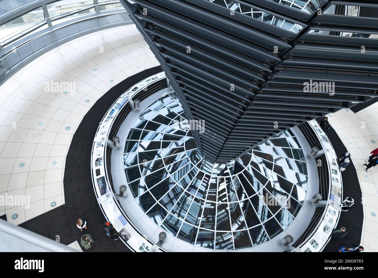 Inside the Bundestag dome. Tourists visit the parliament building of ...
