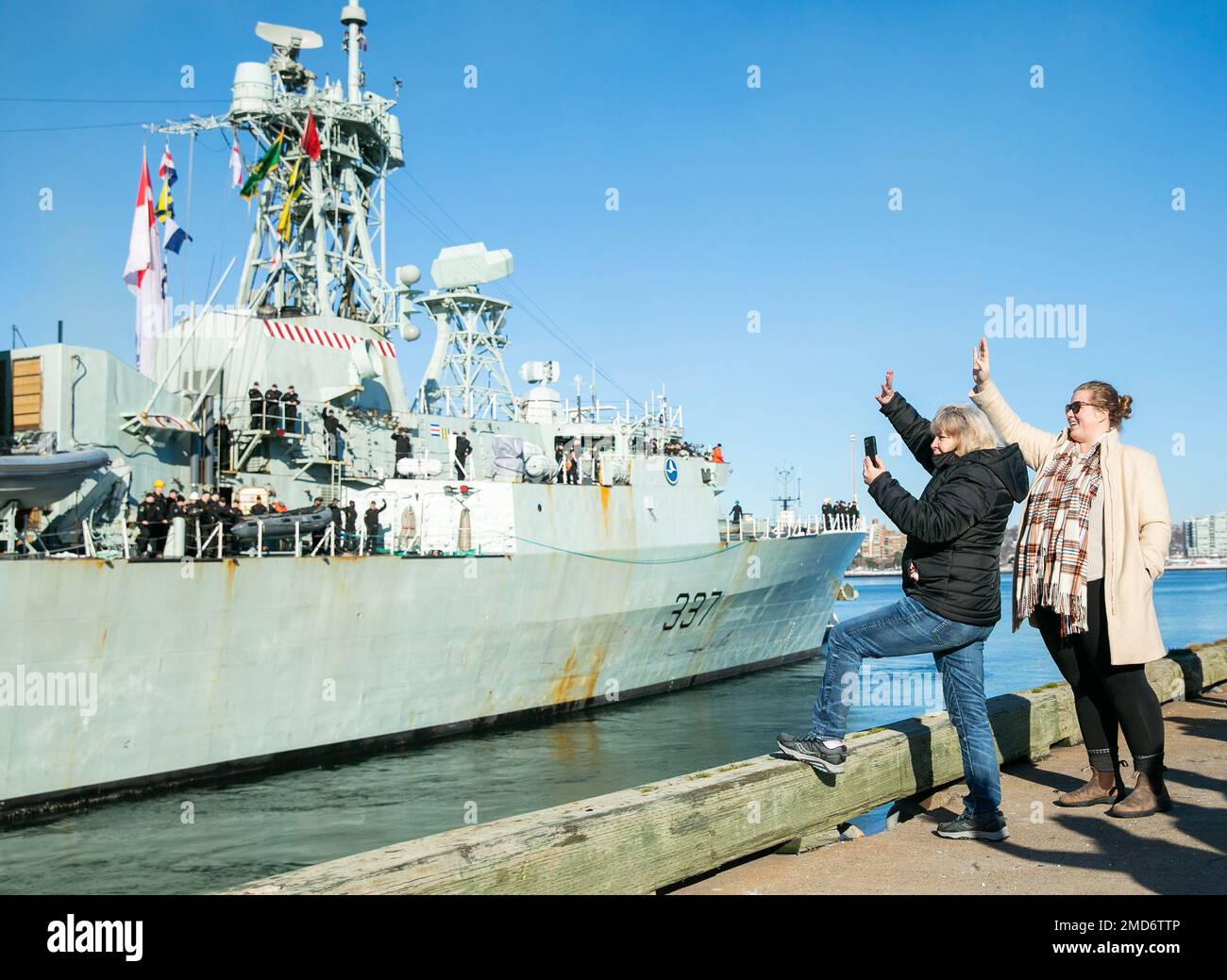 People wave as HMCS Fredericton deploys to the Mediterranean Sea on ...