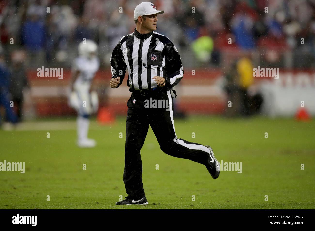Referee Craig Wrolstad (4) watches a play during an NFL football game ...
