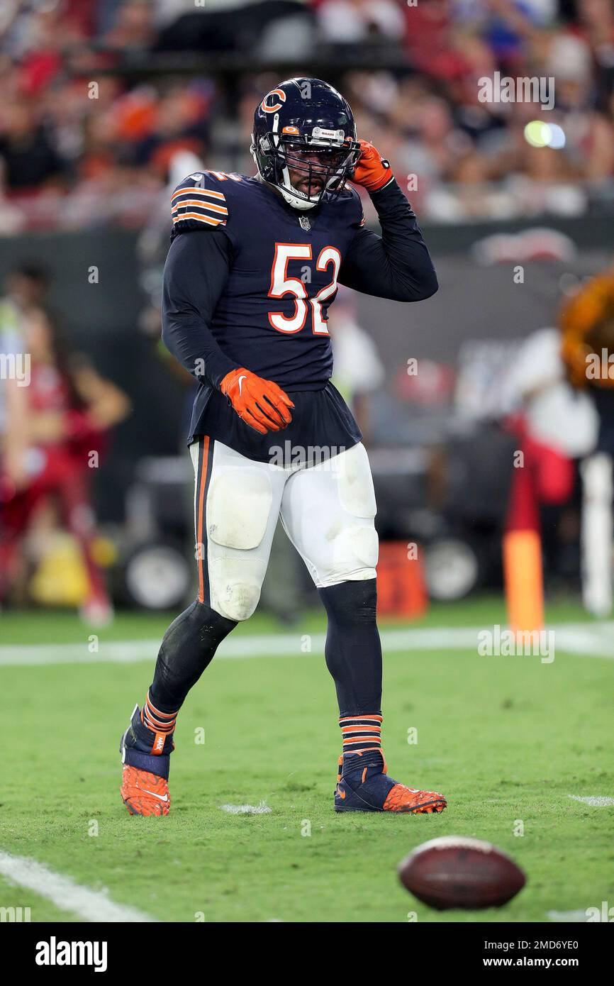 Chicago Bears outside linebacker Khalil Mack (52) walks to the huddle ...