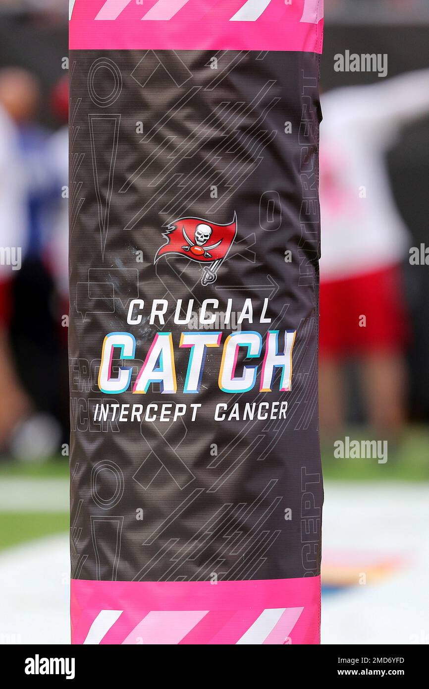 A Crucial Catch banner is seen on the goal post during a NFL football ...