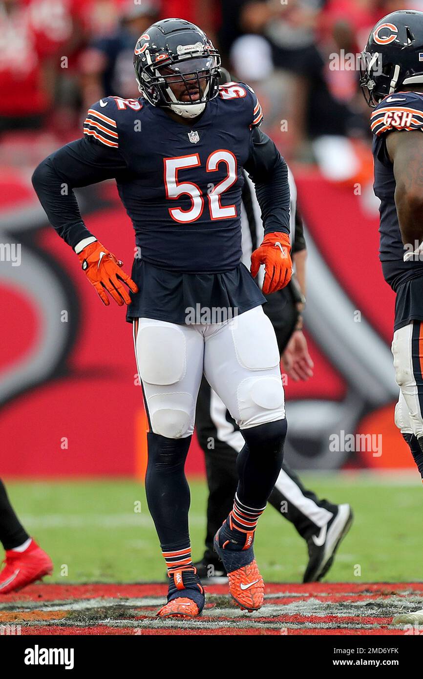 Chicago Bears outside linebacker Khalil Mack (52) react to a play ...