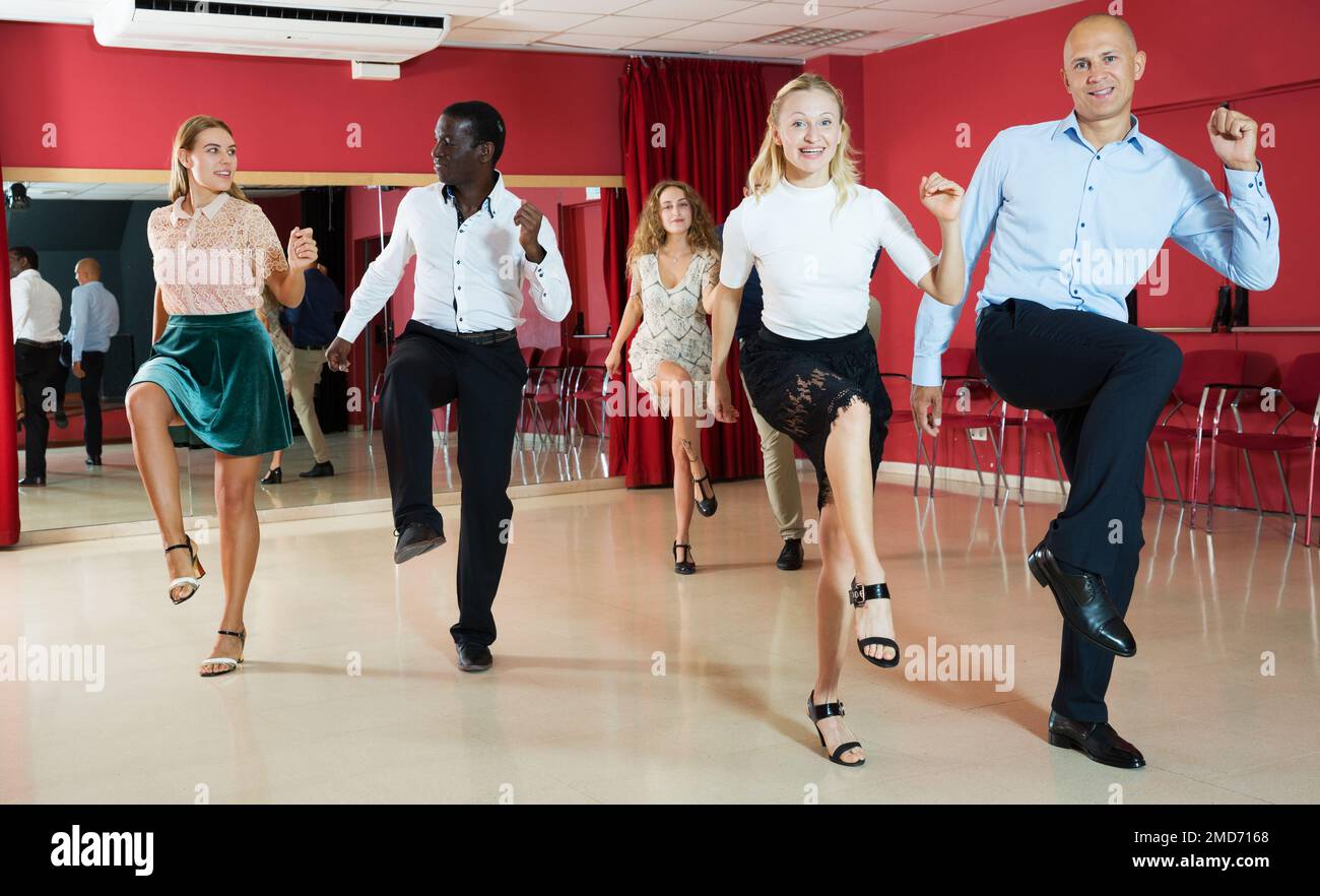 People dancing rock-and-roll in pairs Stock Photo - Alamy