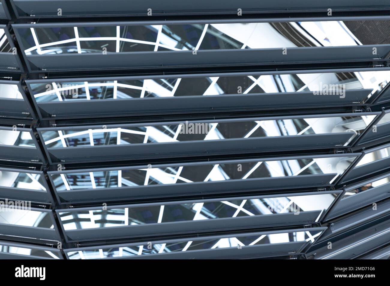 Inside the Bundestag dome. Tourists visit the parliament building of ...