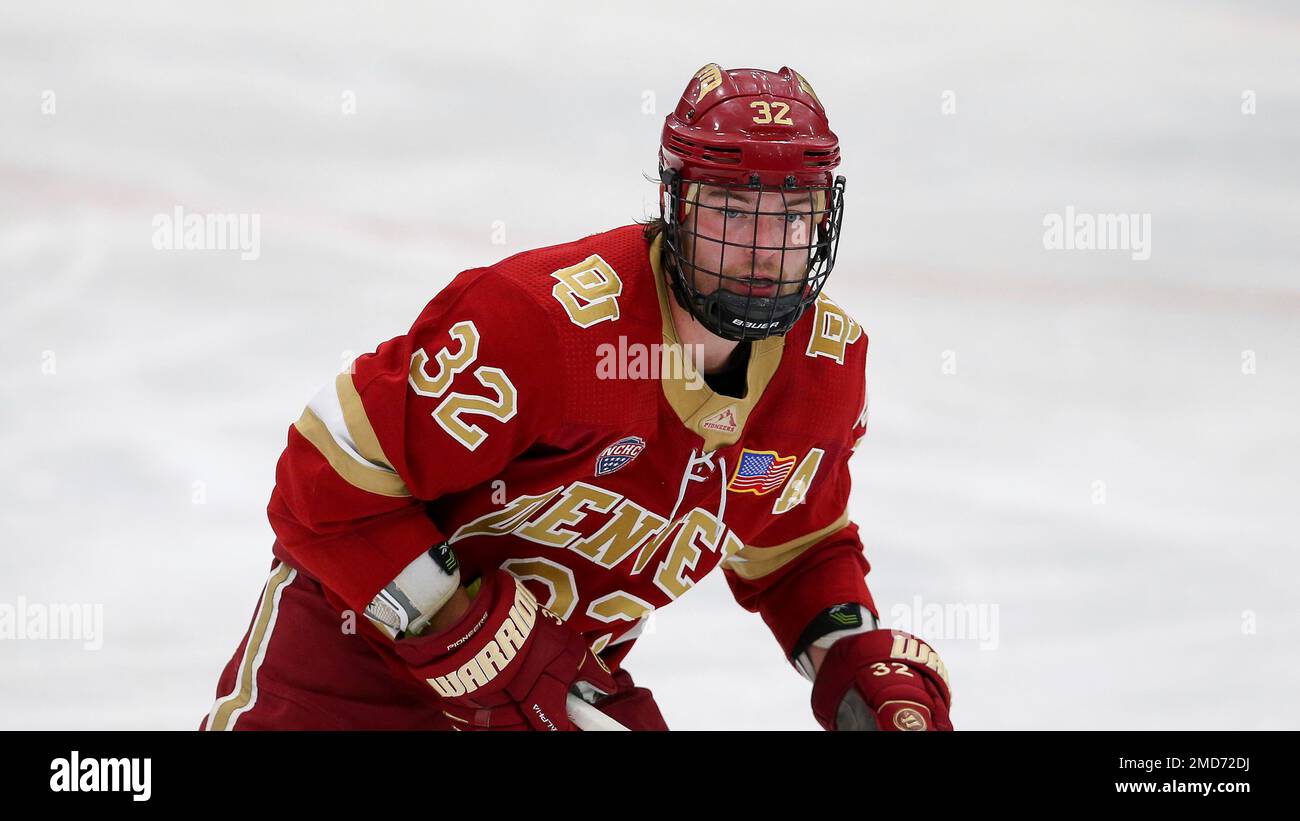 Denver's Justin Lee (32) skates during the second period of an NCAA ...