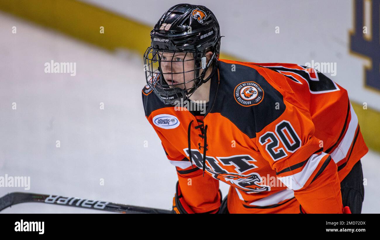 RIT's Caleb Moretz (20) during an NCAA hockey game against Notre Dame ...