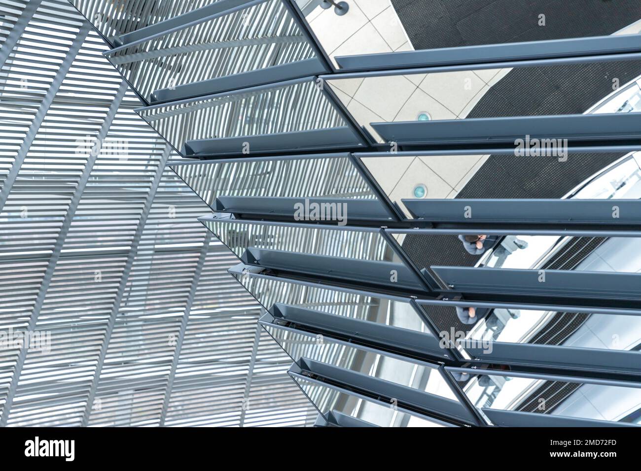 Inside the Bundestag dome. Tourists visit the parliament building of ...
