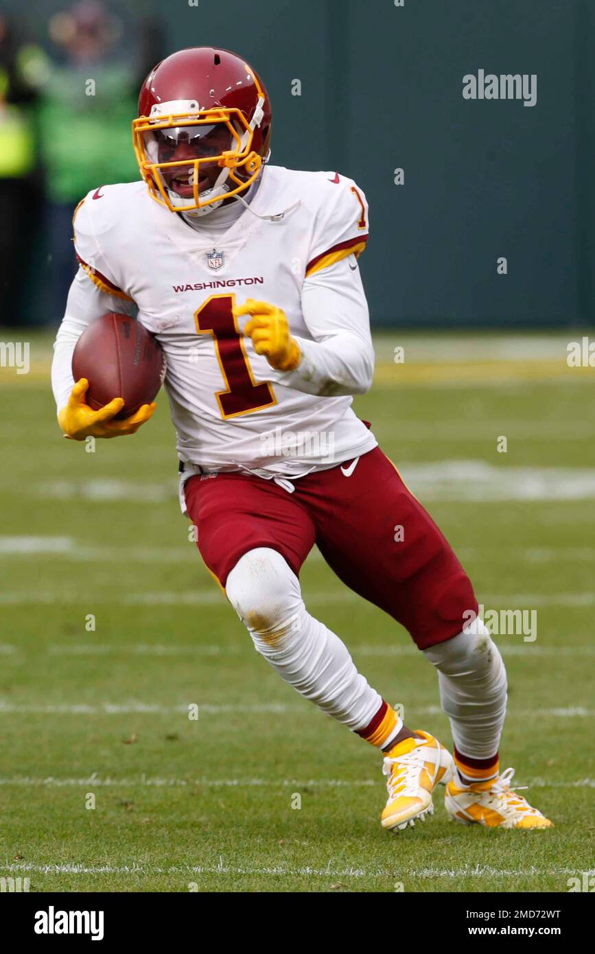 Washington Football Team wide receiver DeAndre Carter (1) runs the ball ...
