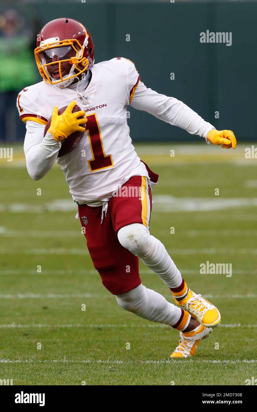 Washington Football Team wide receiver DeAndre Carter (1) runs the ball ...