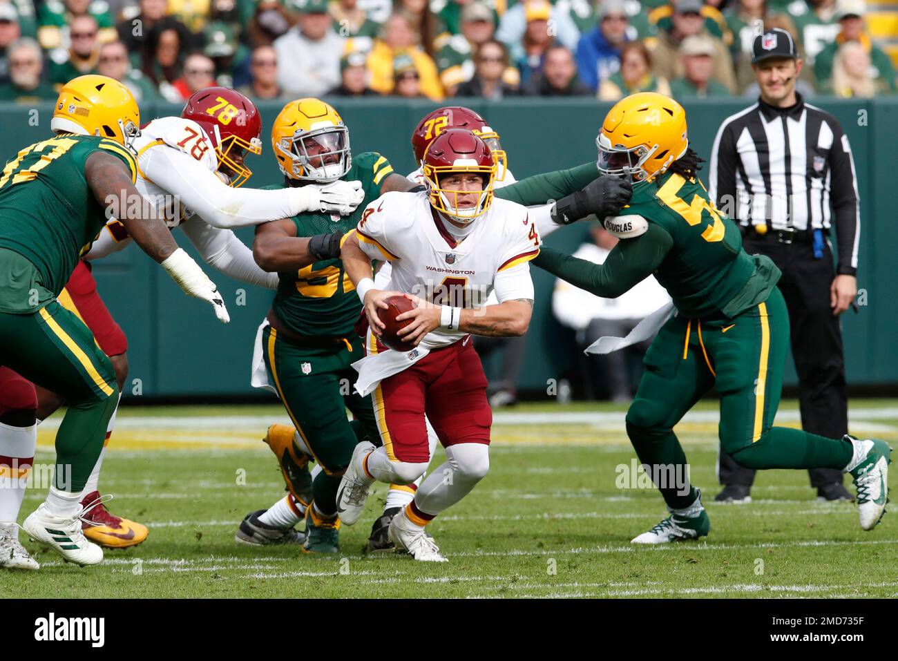 Washington Football Team quarterback Taylor Heinicke (4) runs with the ...