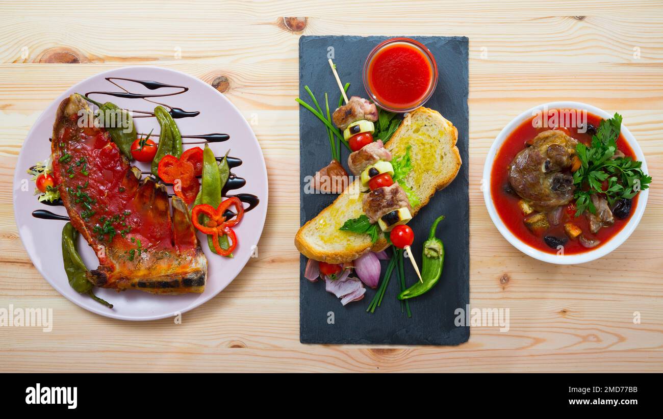 Image of tasty cooked different dishes from lamb with greens and ...
