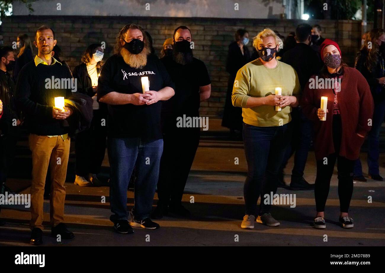 Attendees hold candles at a vigil for the late cinematographer Halyna ...